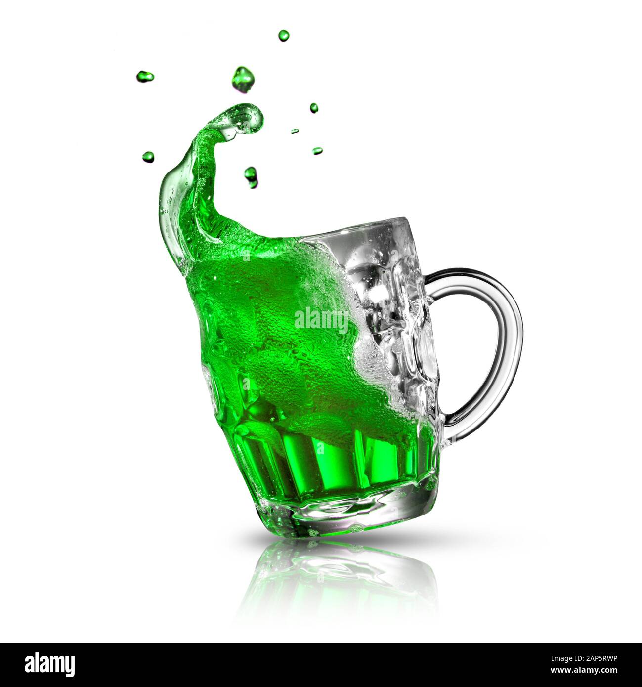 Green alcoholic drink splash in a beer mug on a white Stock Photo - Alamy