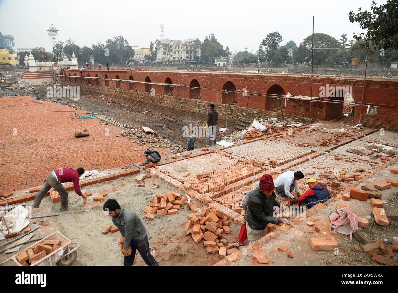 (200121) -- KATHMANDU, Jan. 21, 2020 (Xinhua) -- People work at the ...