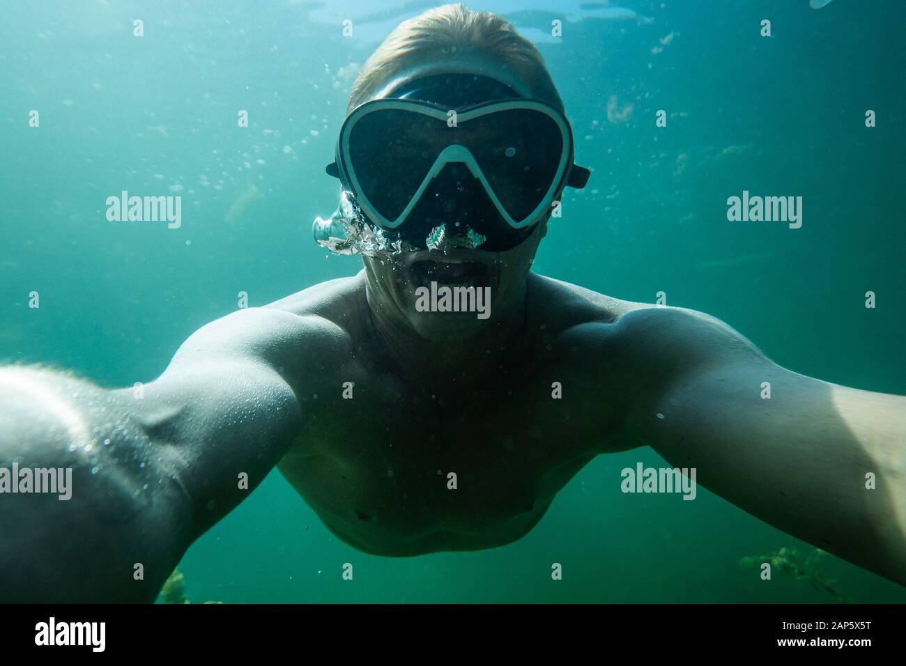 Free diver ascending hi-res stock photography and images - Alamy
