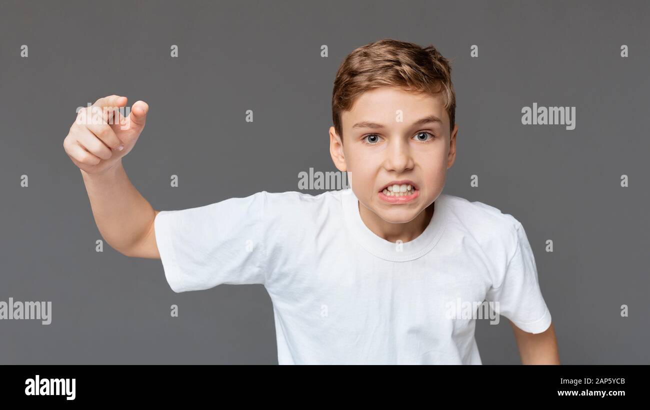 Emotional teenage boy screaming and gesturing at camera Stock Photo - Alamy