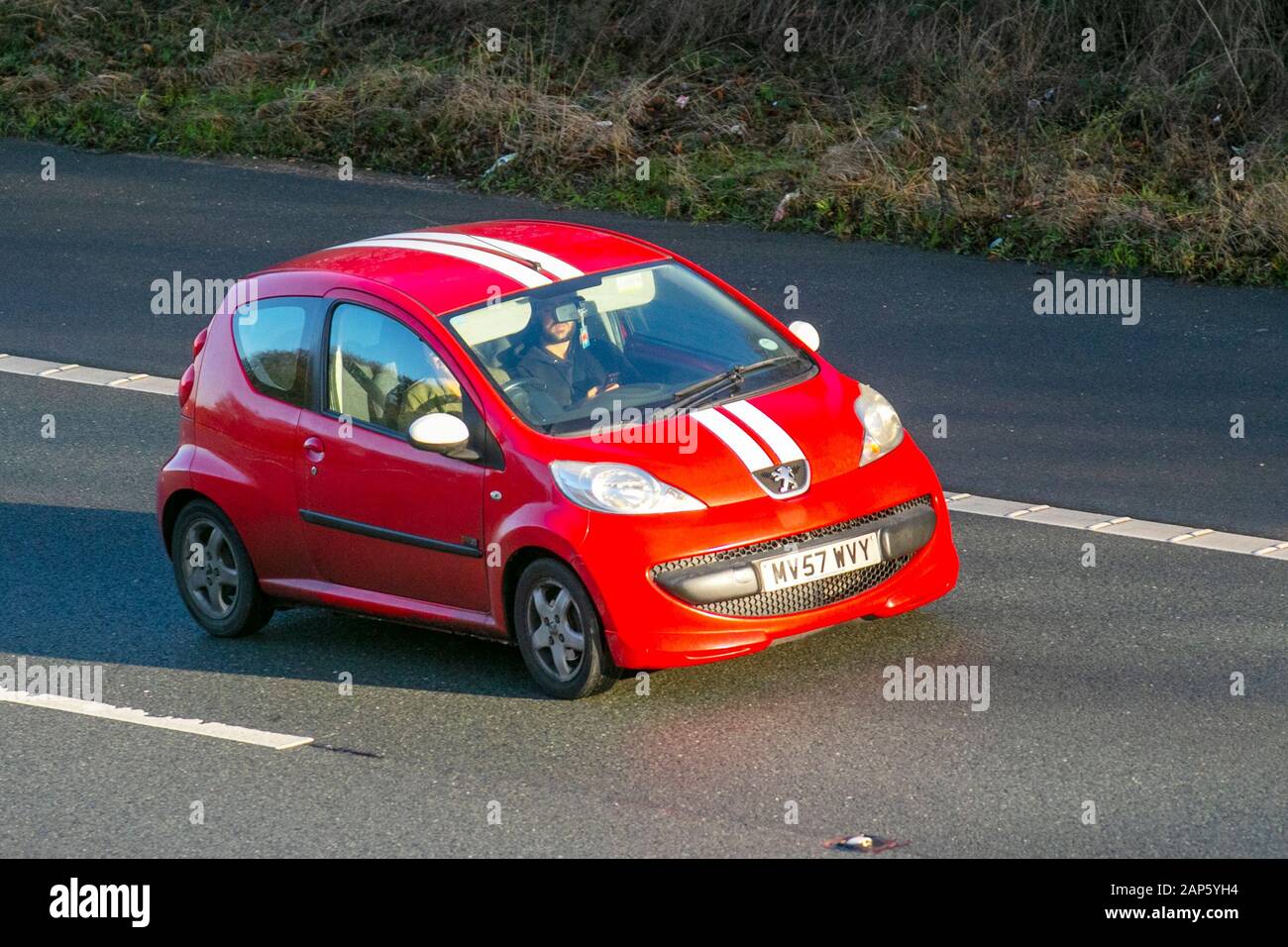 2007 red Peugeot 107 Sport XS; Vehicular traffic, transport, modern ...