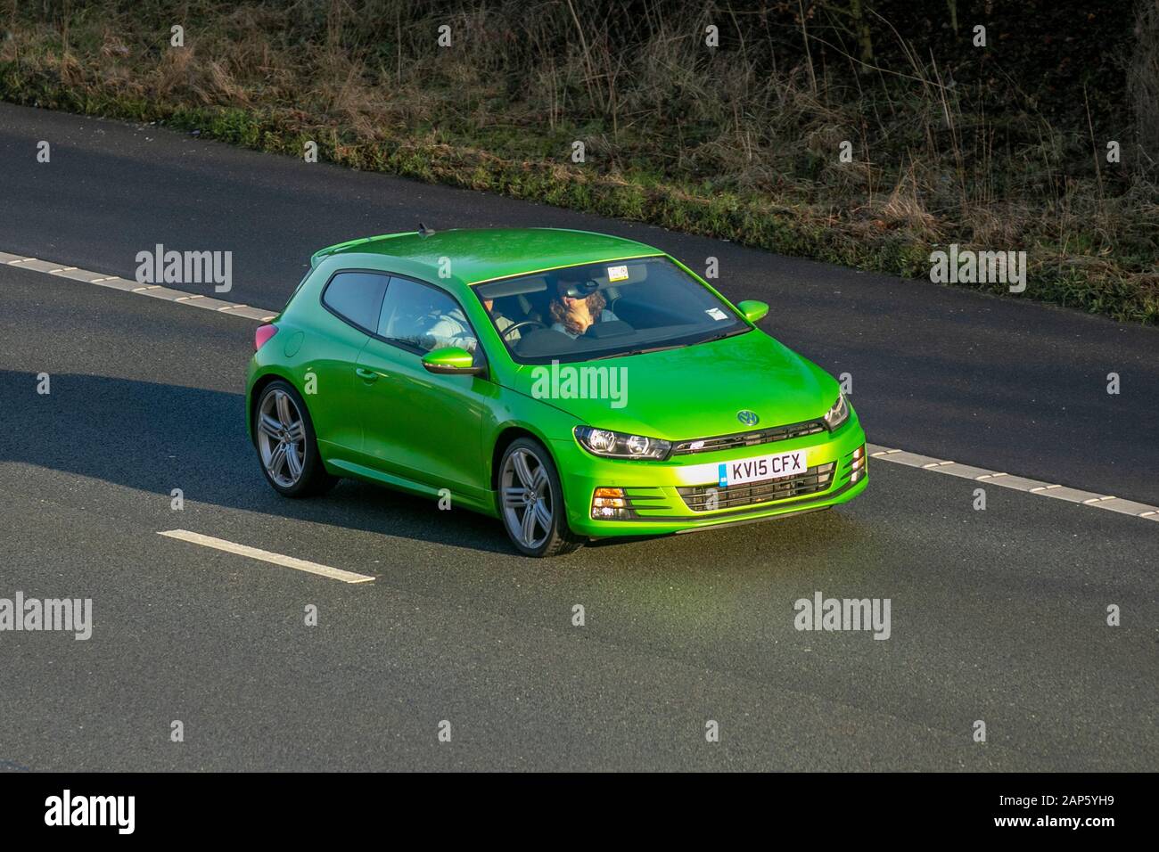 2015 green VW Volkswagen Scirocco R Line Blue Tech; Vehicular traffic ...