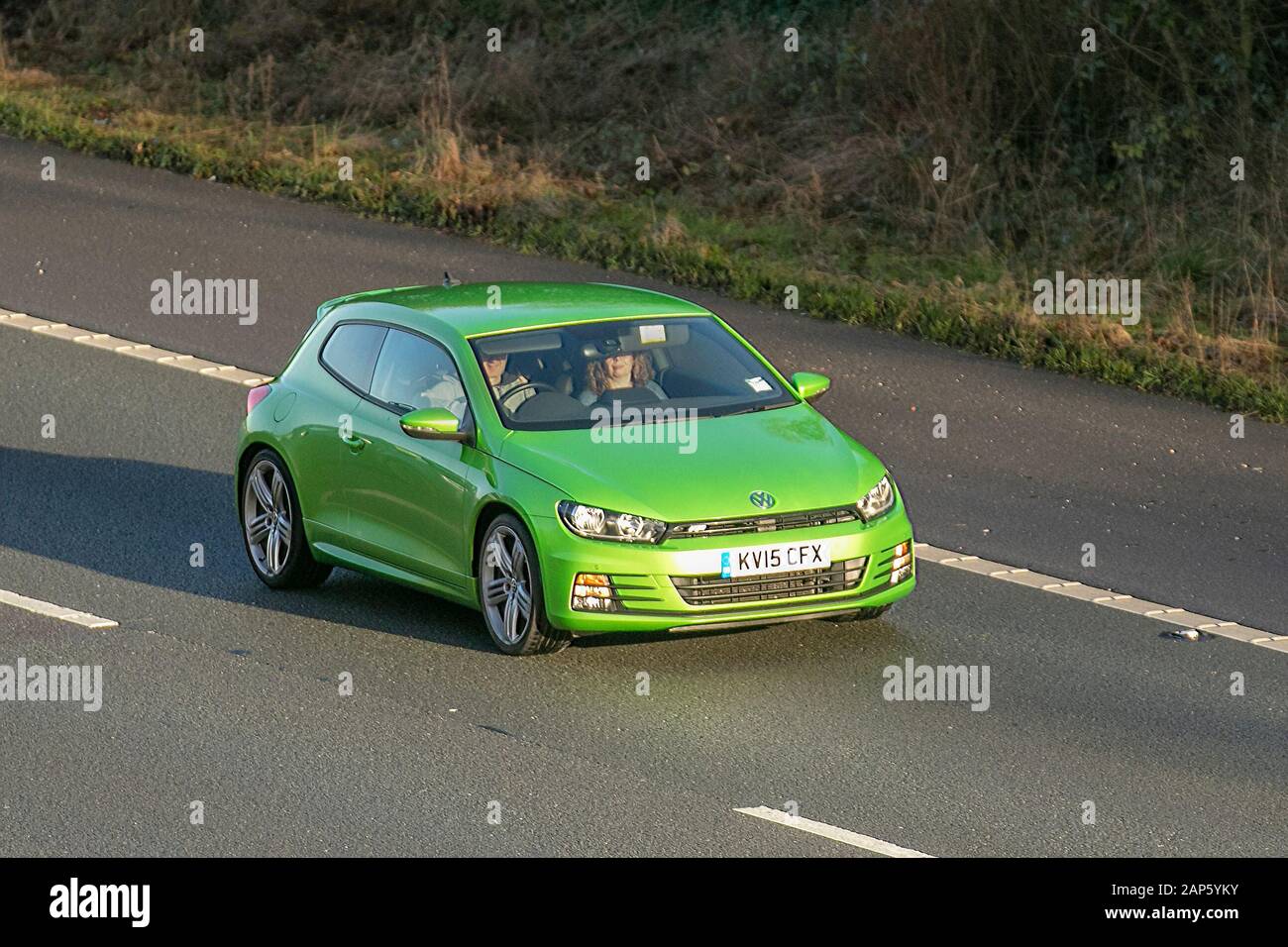 2015 green VW Volkswagen Scirocco R Line Blue Tech; Vehicular traffic ...