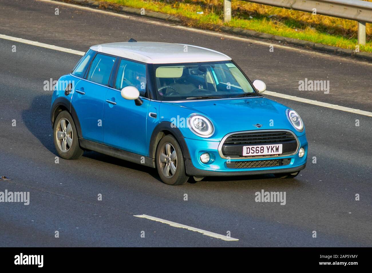 2019 blue white Mini Cooper Classic; Vehicular traffic, transport ...