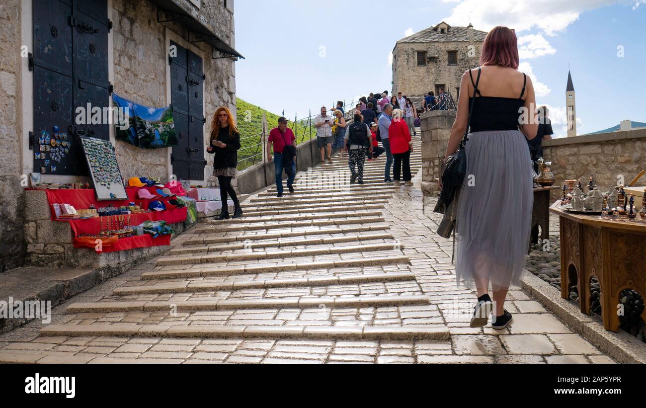 MOSTAR, BOSNIA AND HERZEGOVINA, April 2019: Tourists at Old Bridge in ...