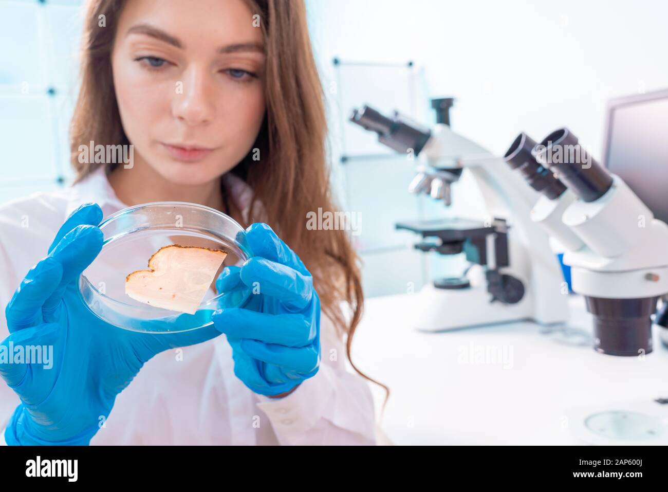 Young woman in food quality control lab Stock Photo - Alamy