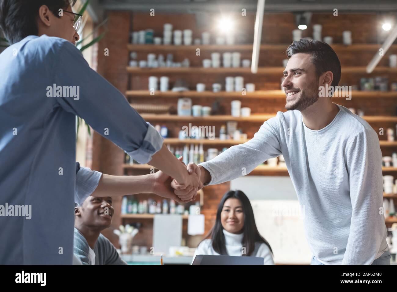 Two multiracial colleagues hi-res stock photography and images - Alamy