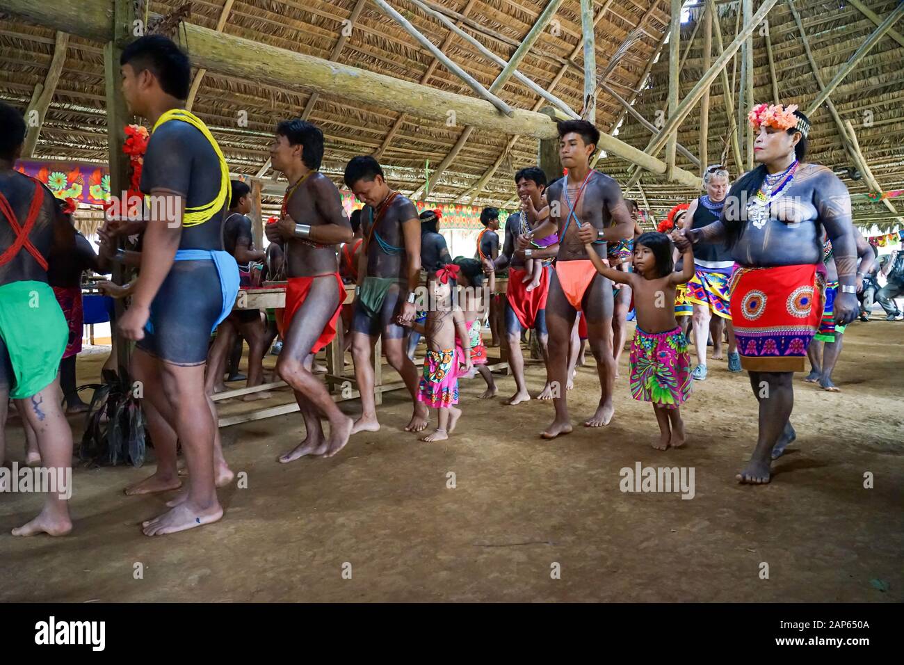 Embera Puru women and Men performing dance Village, Embera Puru Village in Panama, indigenous ...
