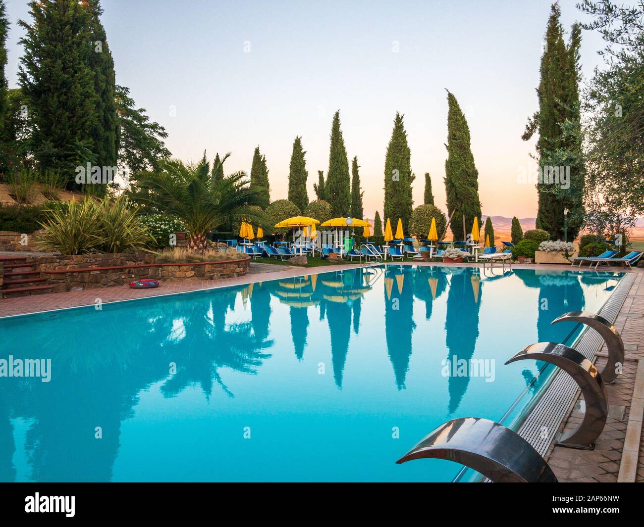 Swimming pool in the hotel, blue water Stock Photo - Alamy