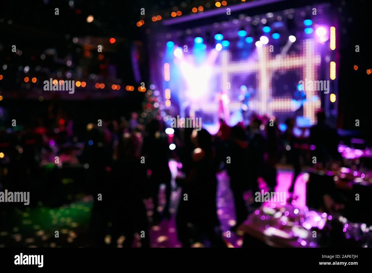 Crowd in front of concert stage blurred hi-res stock photography and ...