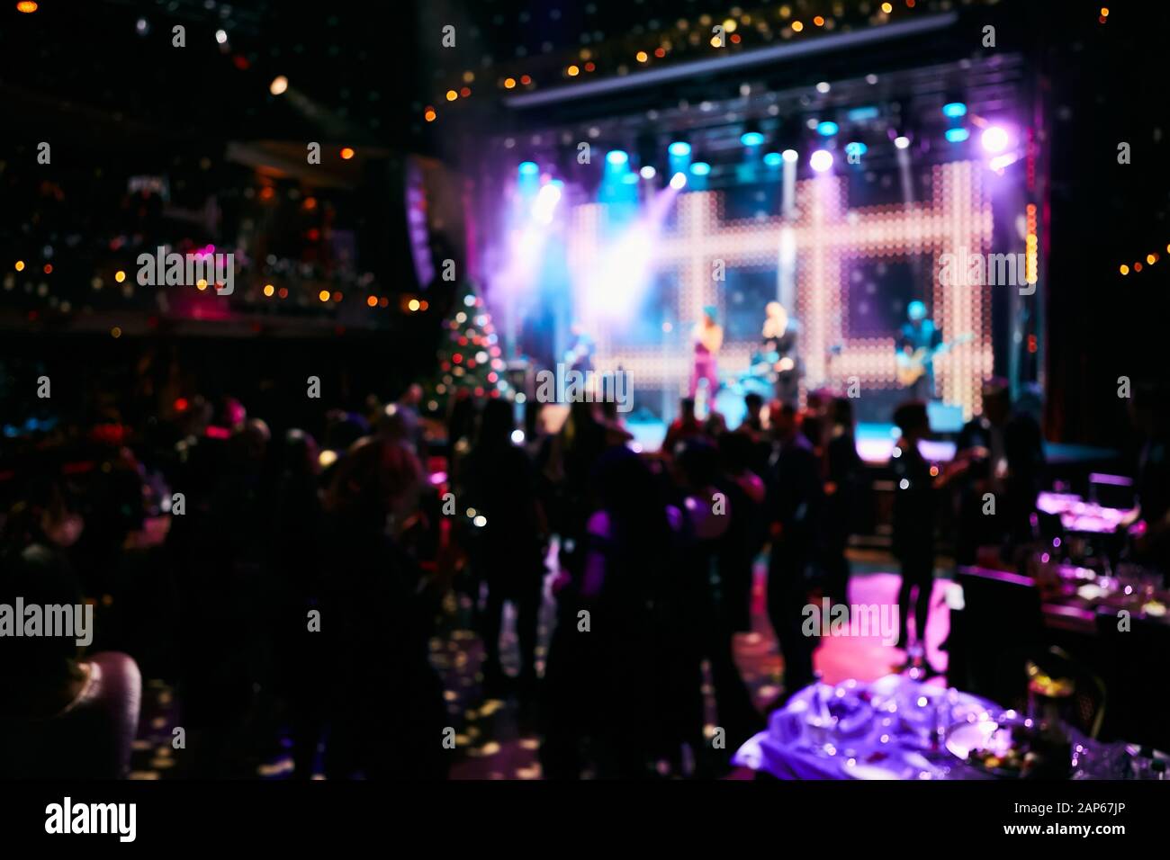 Crowd in front of concert stage blurred hi-res stock photography and ...