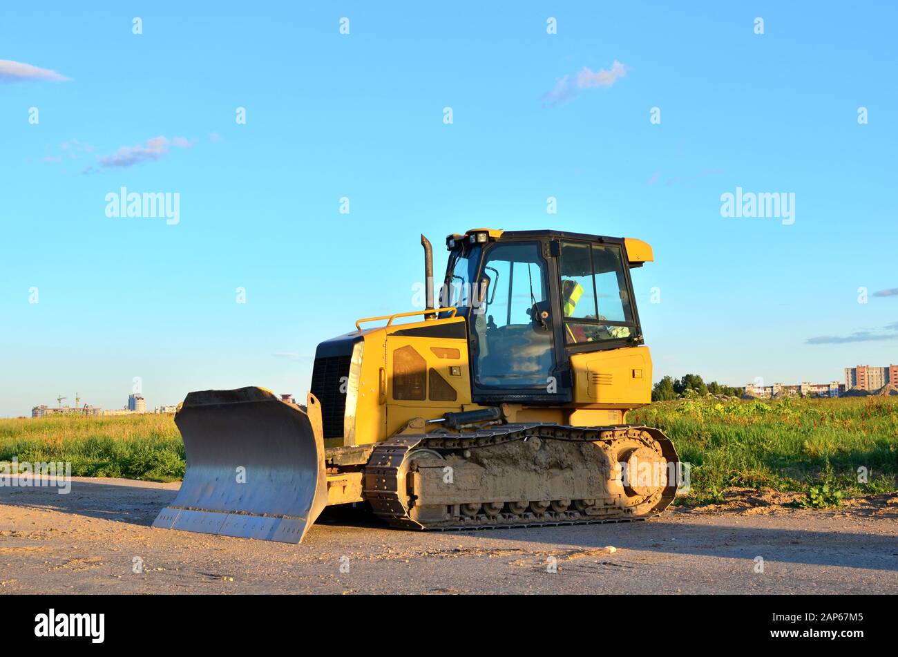 Track-type bulldozer, earth-moving equipment. Land clearing, grading ...