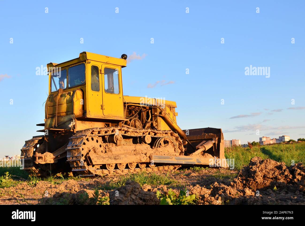 Track-type bulldozer, earth-moving equipment. Land clearing, grading ...