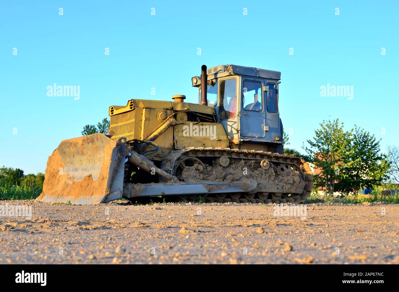 Track-type bulldozer, earth-moving equipment. Land clearing, grading ...