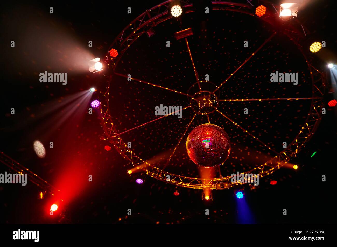 Colorful disco mirror ball lights night club background Stock Photo - Alamy