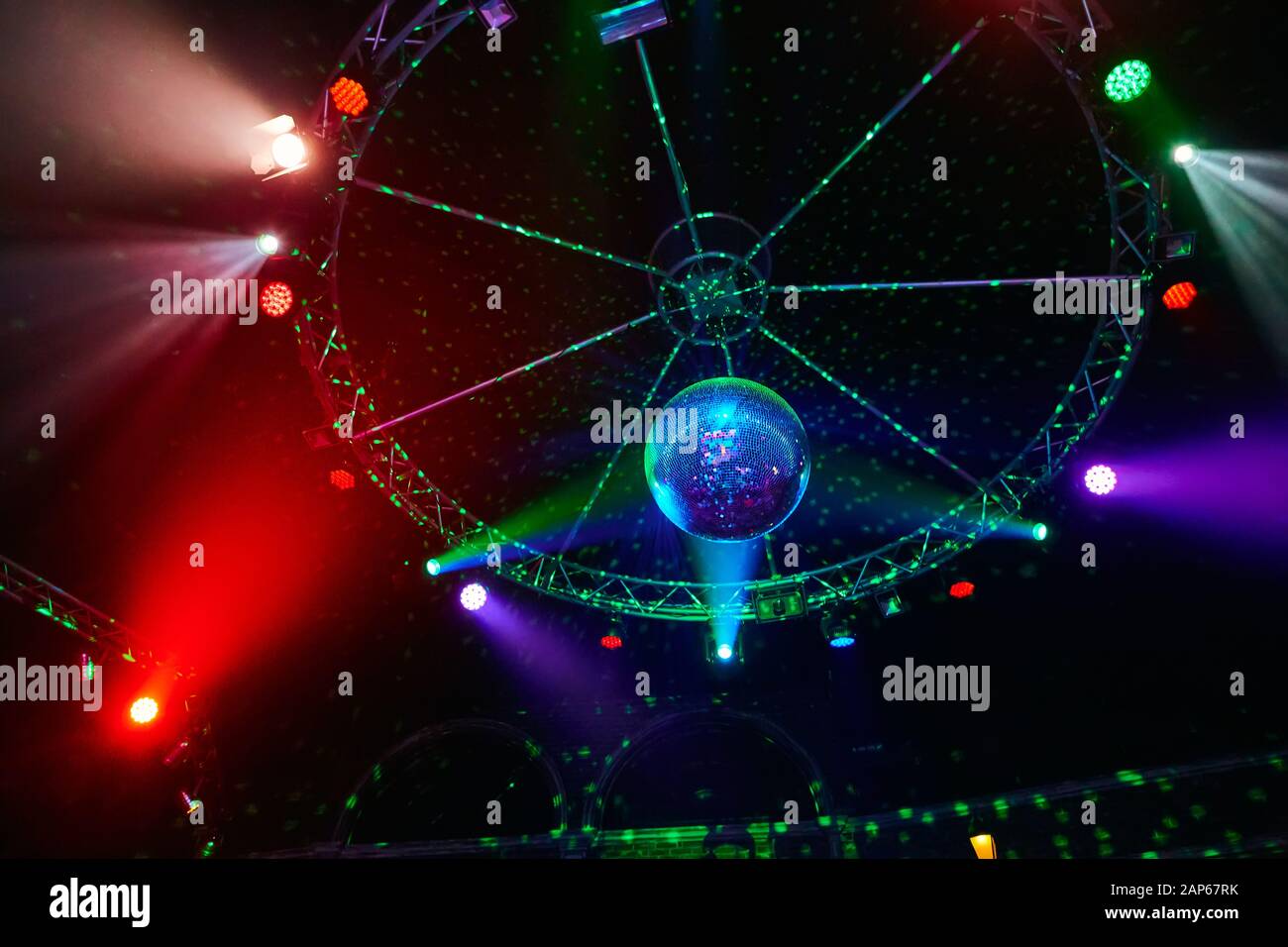 Colorful disco mirror ball lights night club background Stock Photo - Alamy