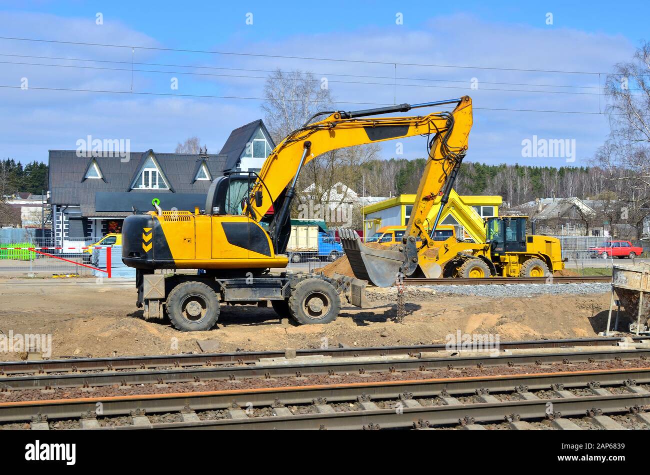 excavator on railway construction Stock Photo - Alamy