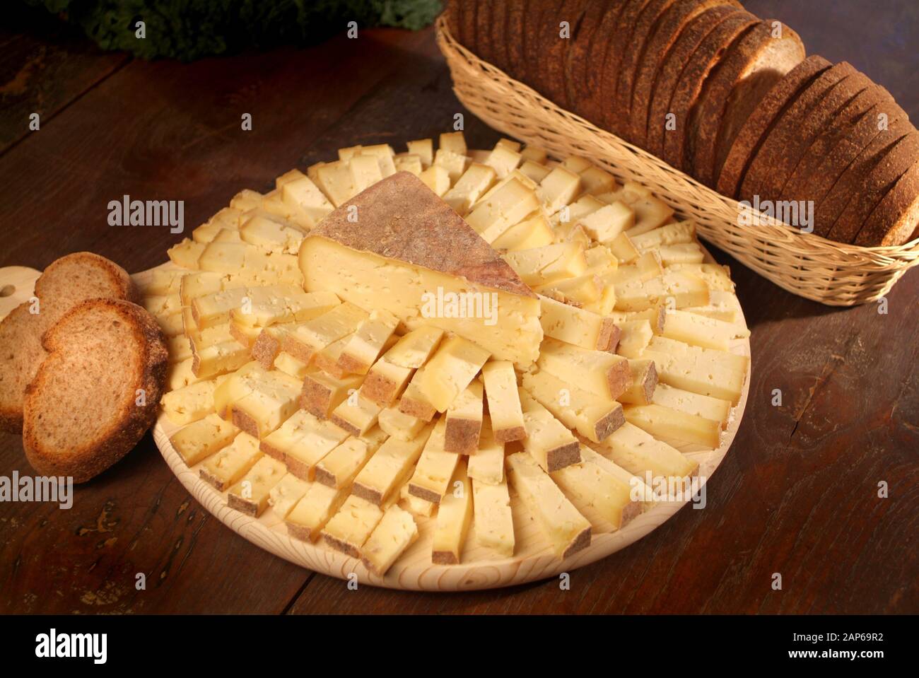 Italian food products Toma alpine cheese of Piedmont Stock Photo - Alamy