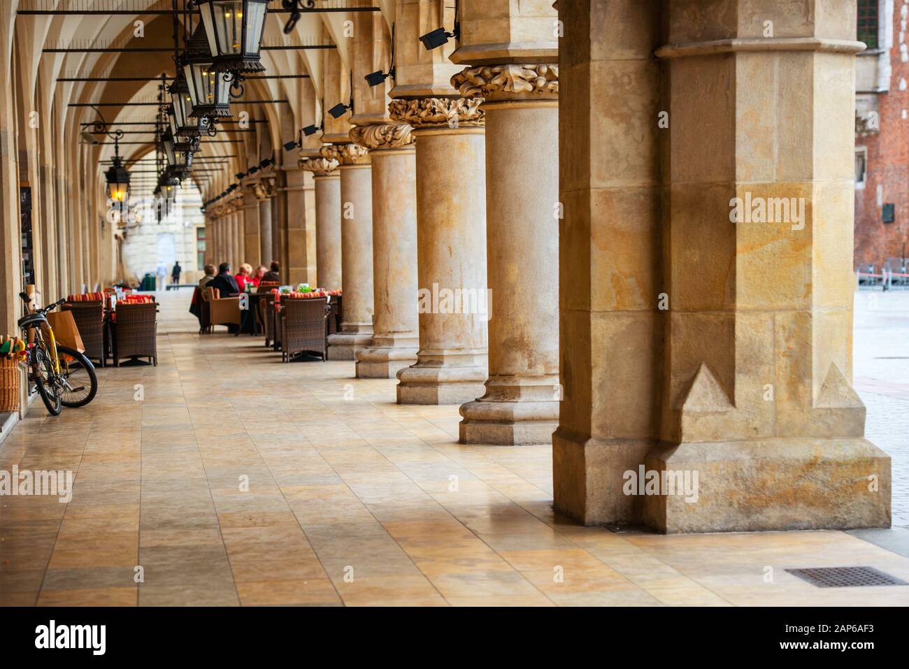Passage of the gothic hall with columns. Main market square of Krakow ...