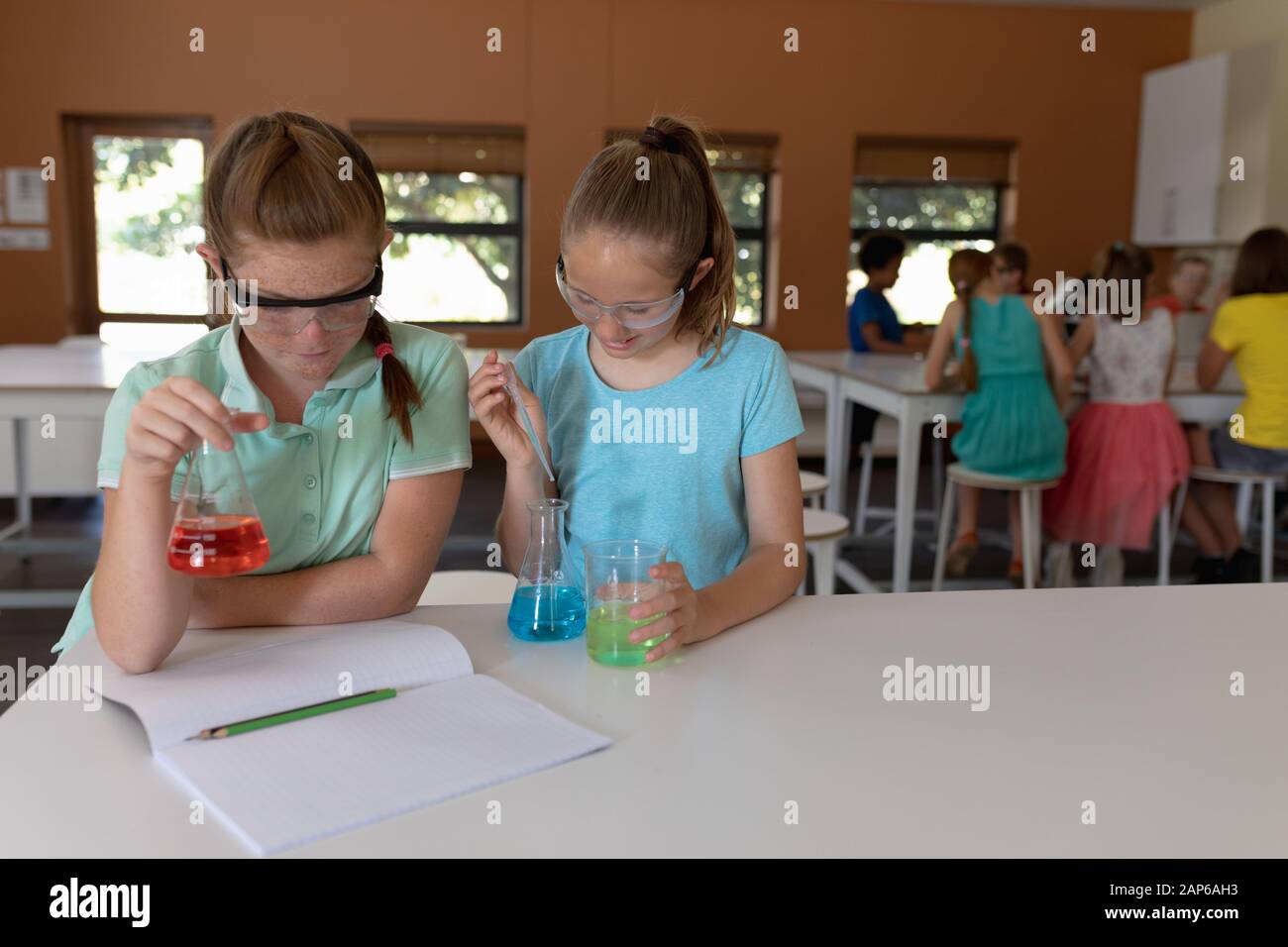 Two Elementary School Girls In Chemistry Class Stock Photo Alamy two-elementary-school-girls-in-chemistry-class-stock-photo-alamy