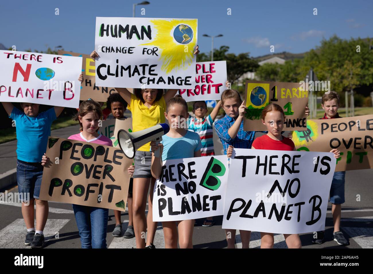 Group of elementary school pupils walking on a protest march Stock ...