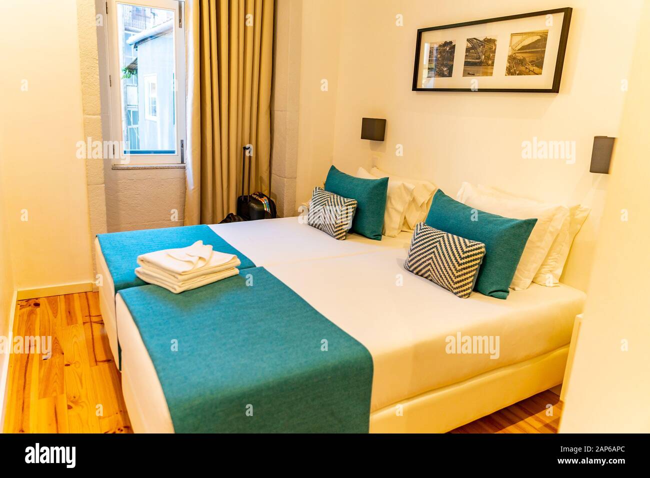 Hotel Room Suite View of Sleeping Chamber with Two Twin Beds with Blue ...