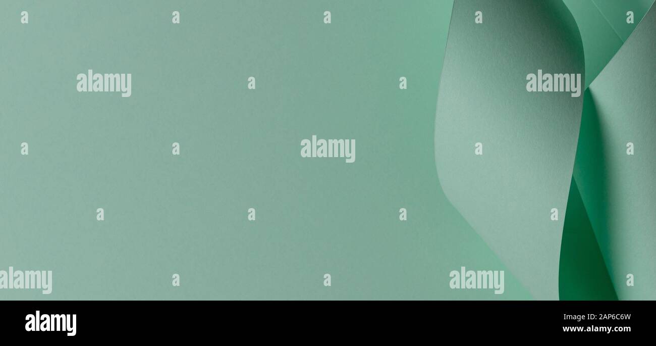 Abstract geometric shape green color paper background Stock Photo - Alamy