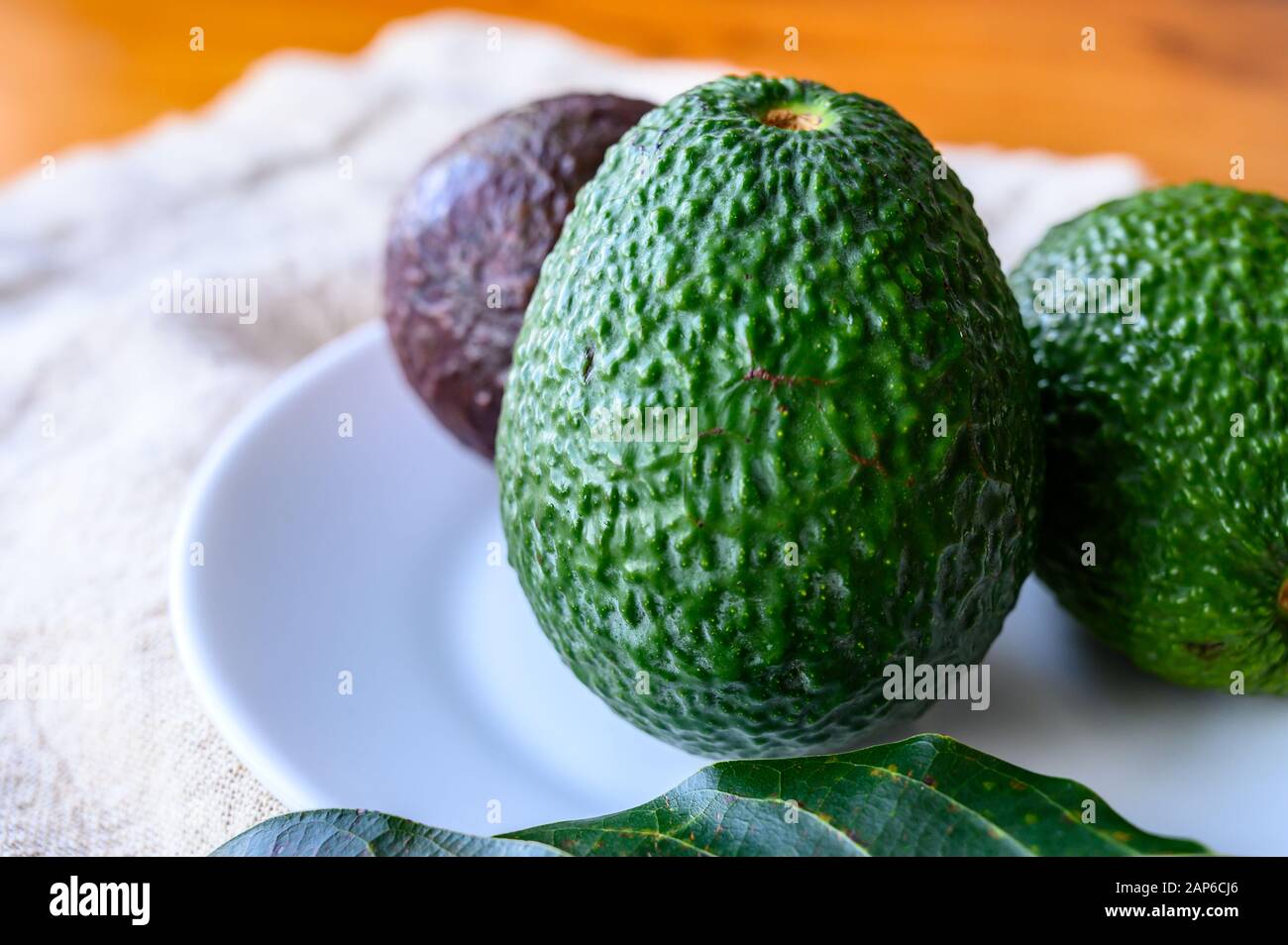 Fresh ripe green and brown avocados fruits ready to eat close up Stock ...