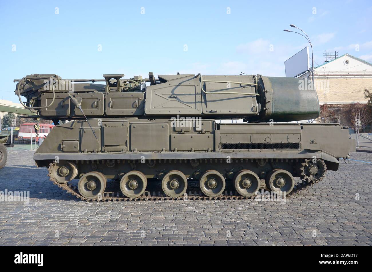 Close up view of green armoured caterpillar transport. Modern military ...