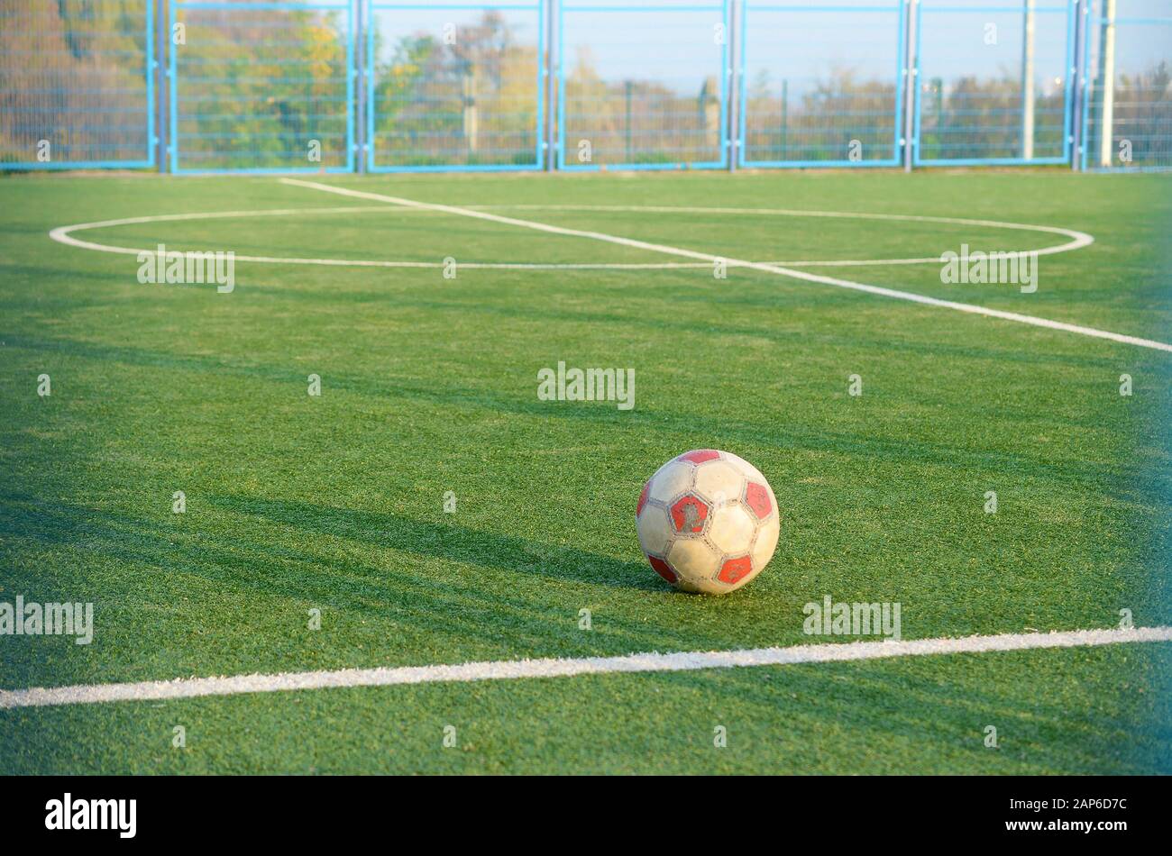 Classic soccer ball on football green grass field outdoor. Active ...