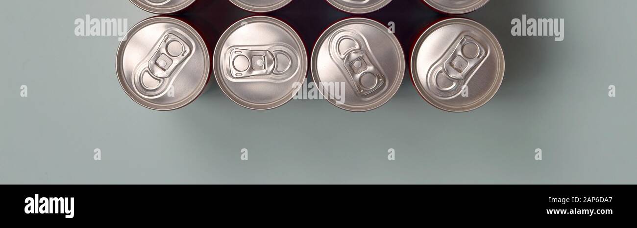 Many new aluminium cans of soda soft drink, lemonade cola, beer or ...