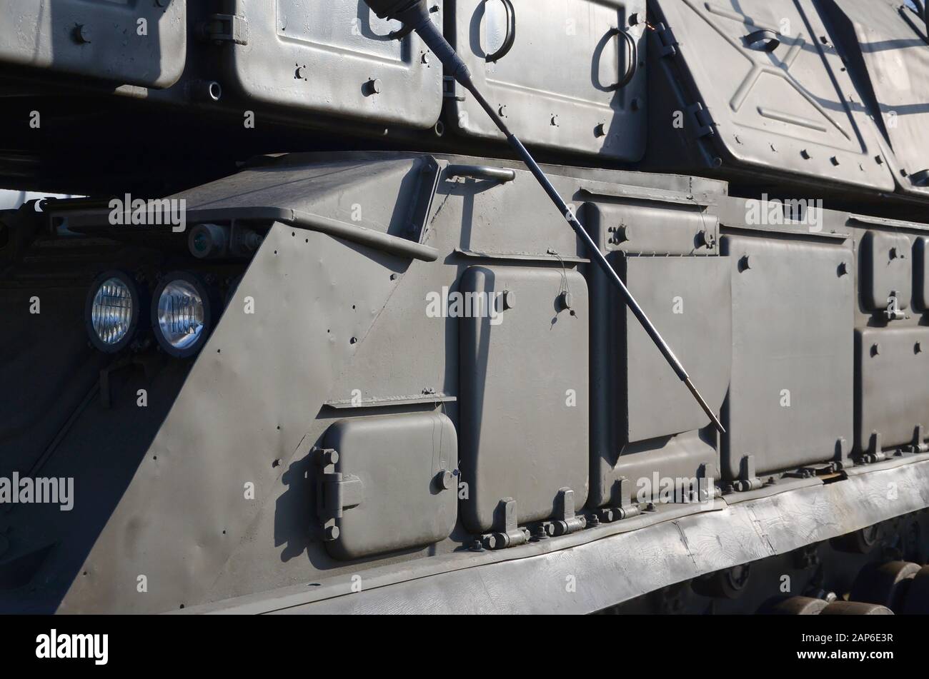 Close up view of green armoured caterpillar transport. Modern military ...