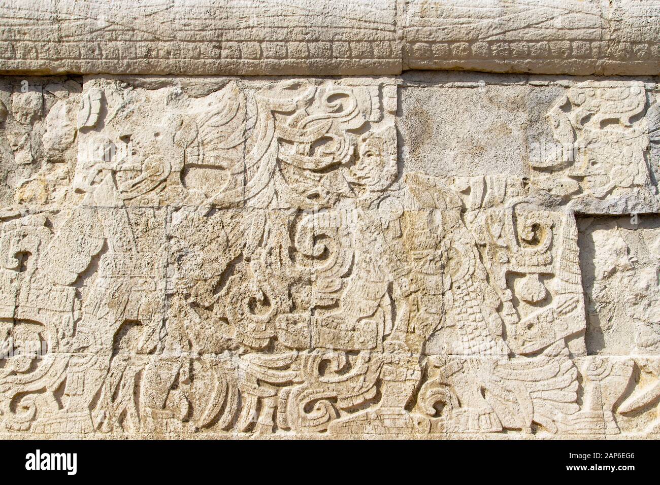 Ancient Mayan carvings of Pok-a-Tok ball players on the wall of the ...