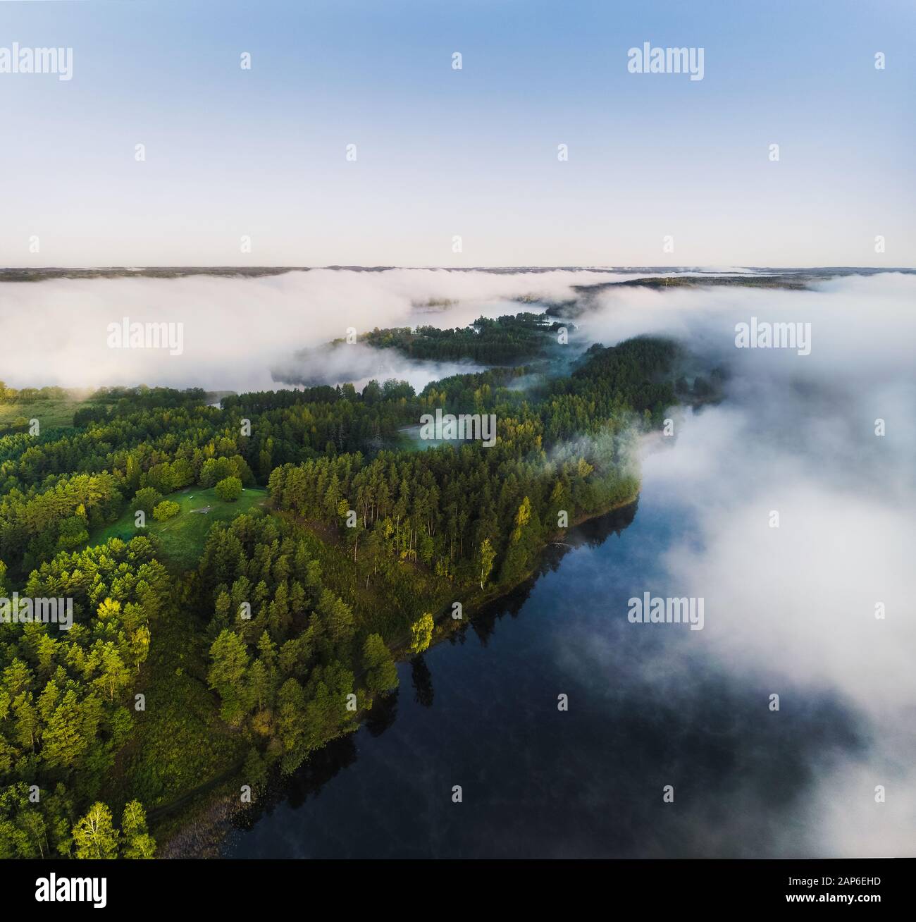Lithuania landscape from the drone perspective in the misty morning ...