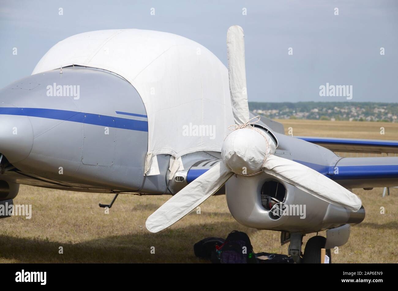 Fabric cover protects the glass and propeller of the aircraft from ...