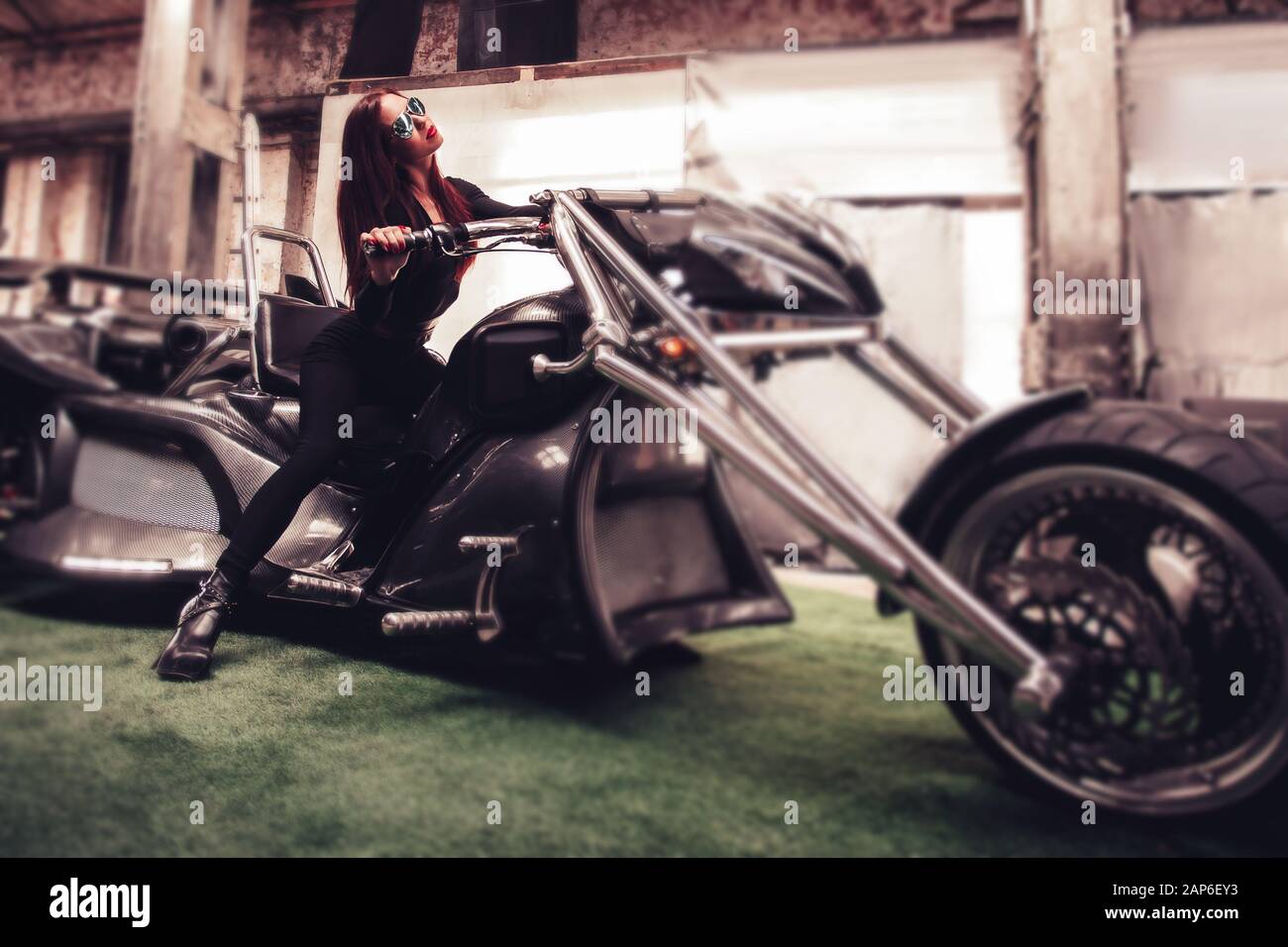 Woman standing next motorcycle hi-res stock photography and images - Alamy