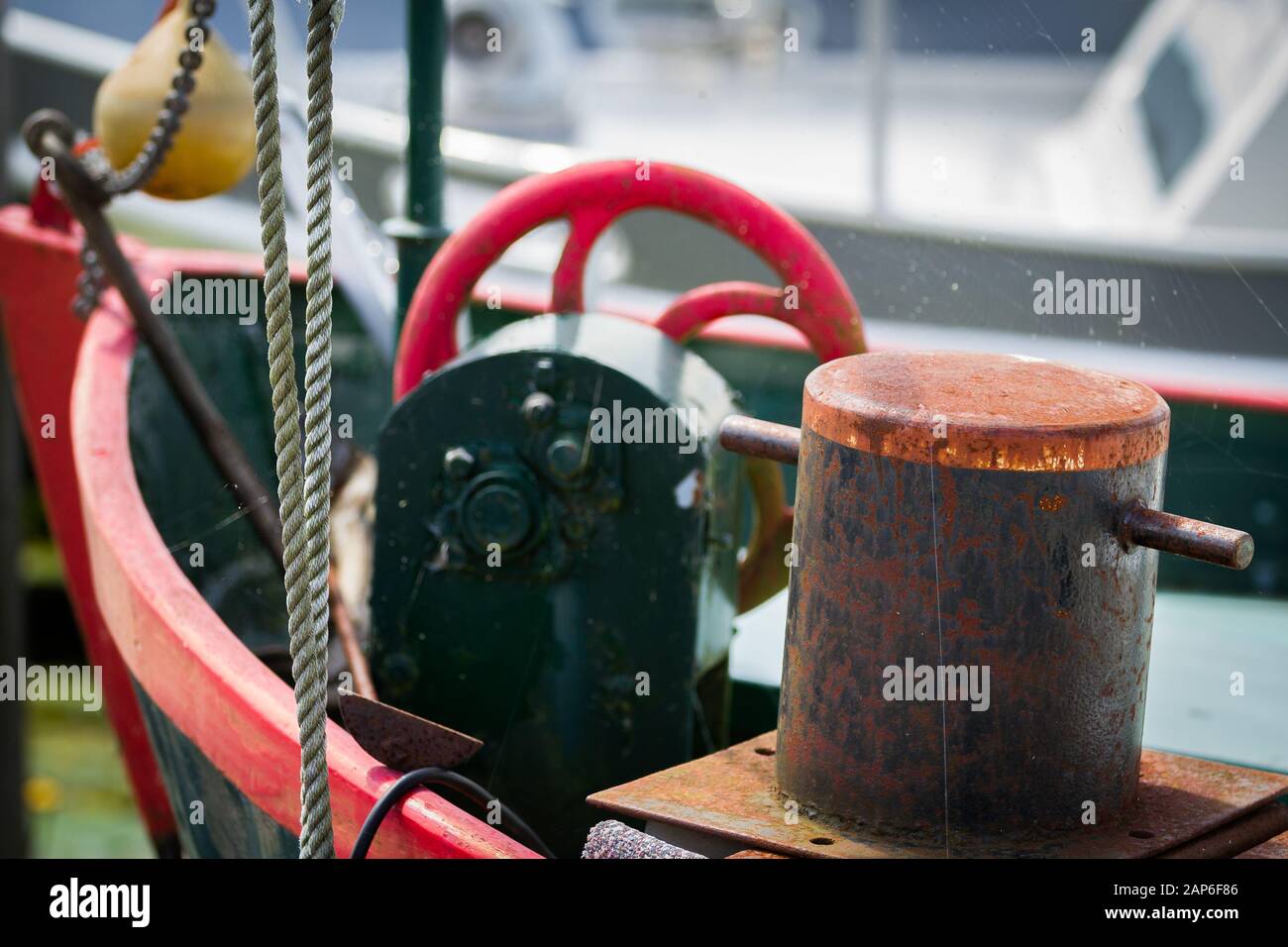 Vintage metal river ship with rusty boulder and ropes Stock Photo - Alamy