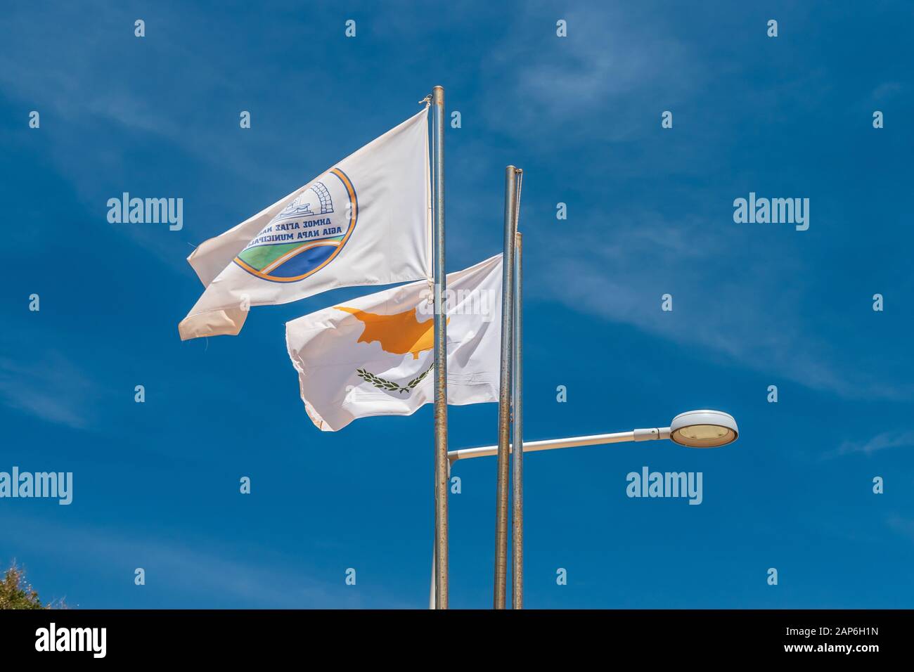 The flag of Agia Napa municipality and the flag of Cyprus. Flags on the ...
