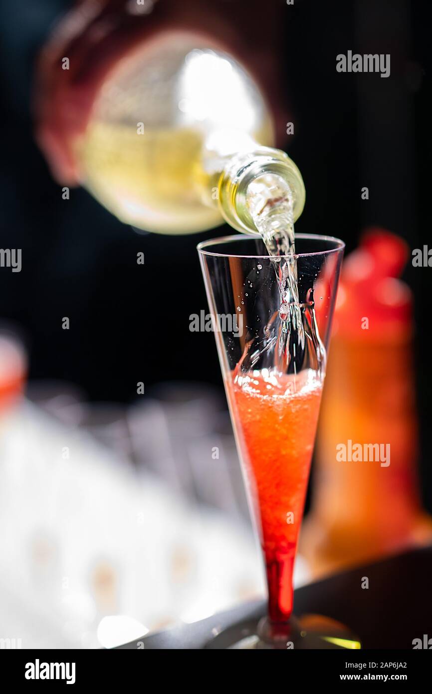 Bartender pouring red liquor hi-res stock photography and images - Alamy