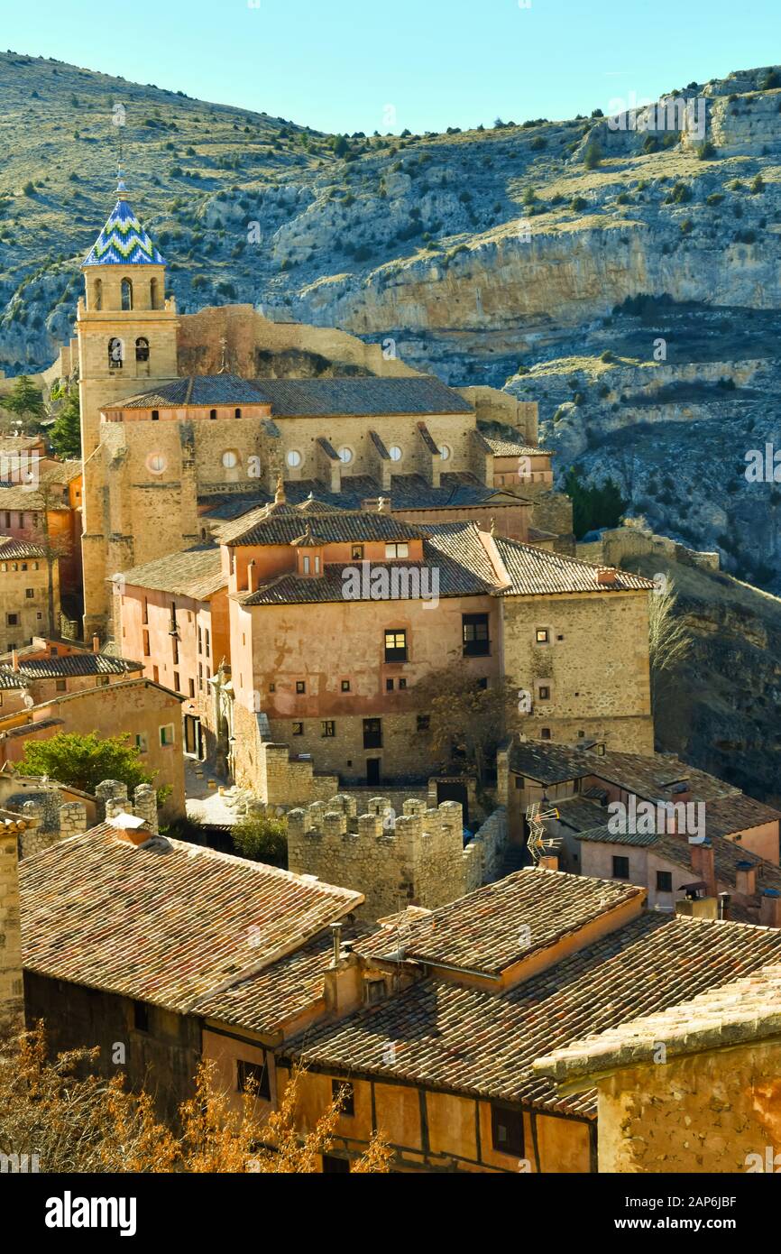 Beautiful medieval church surrounded by old houses Stock Photo - Alamy
