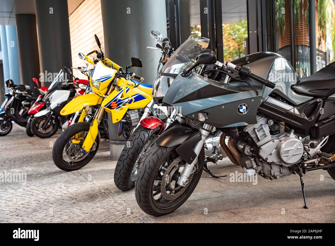 Parked motorcycles on a city street in Berlin, Germany Stock Photo - Alamy