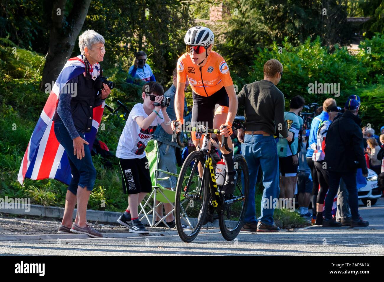 Dutch (Van Vleuten) road racing cyclist riding uphill, competing in ...
