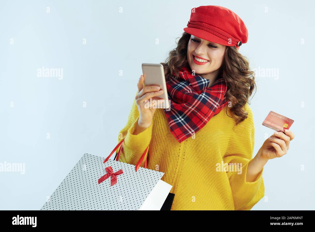 Smiling brunette customer buying hi-res stock photography and images ...