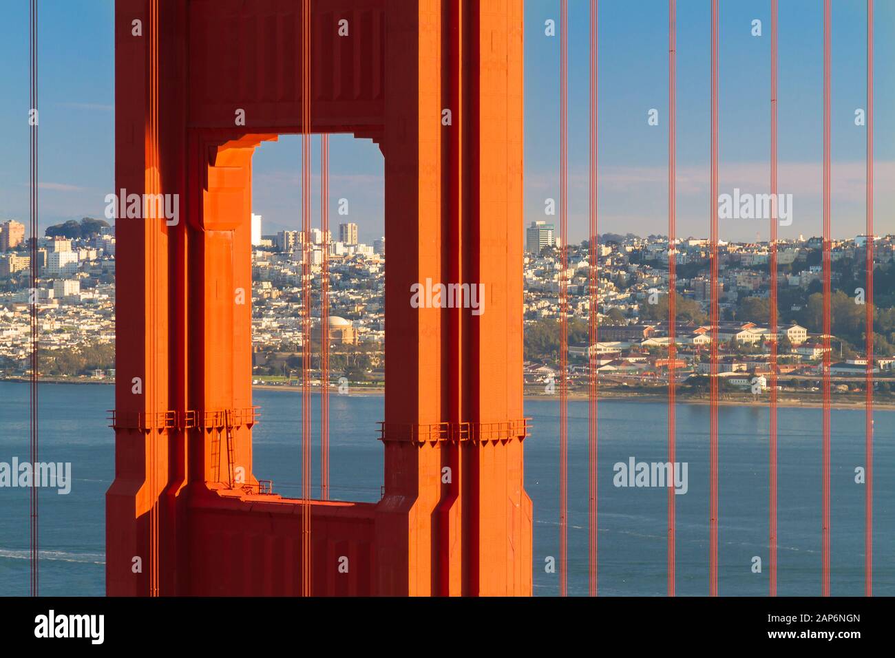 Golden Gate Bridge close-up with San Francisco skyline in background ...