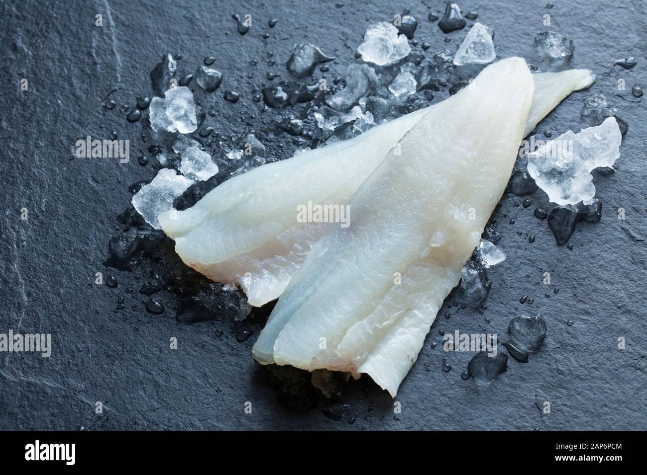 Two raw whiting fillets, Merlangius merlangus, from a whiting caught in ...