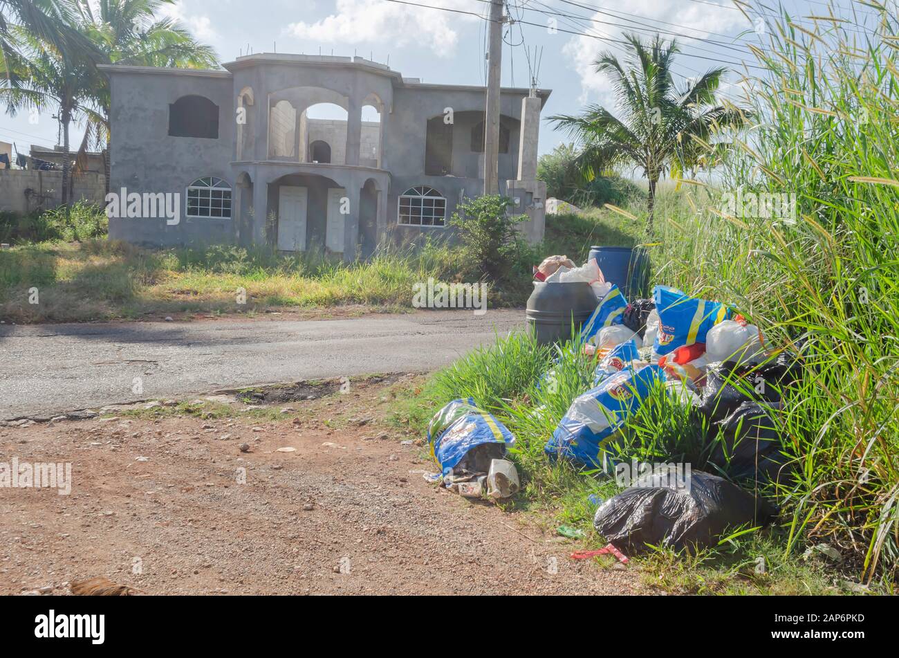 Garbage Deposited At The Side Of A Roadway In Jamaica Awaiting ...