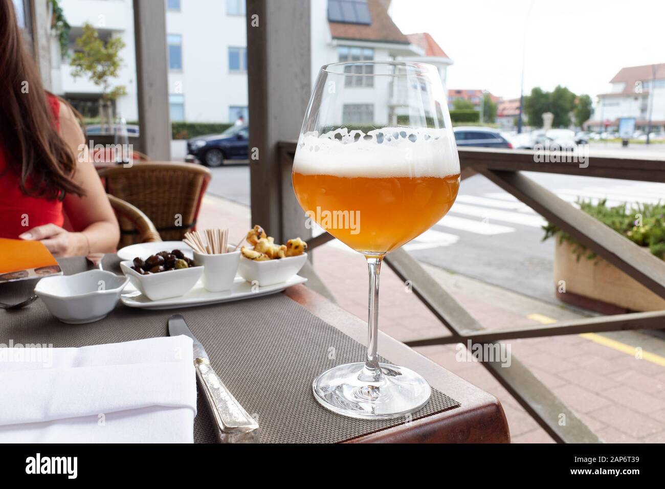 Glas of belgium bier in a restaurant at lunch in beach resort Knokke ...