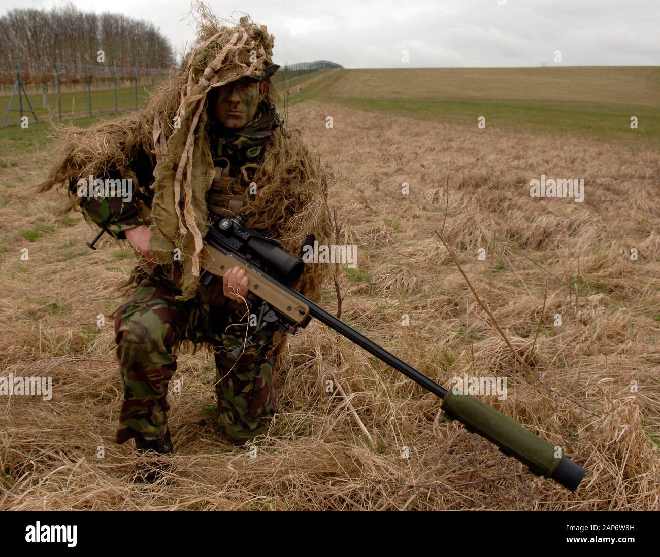 British Infantryman with a long range sniper rifle L115A3 which has a ...