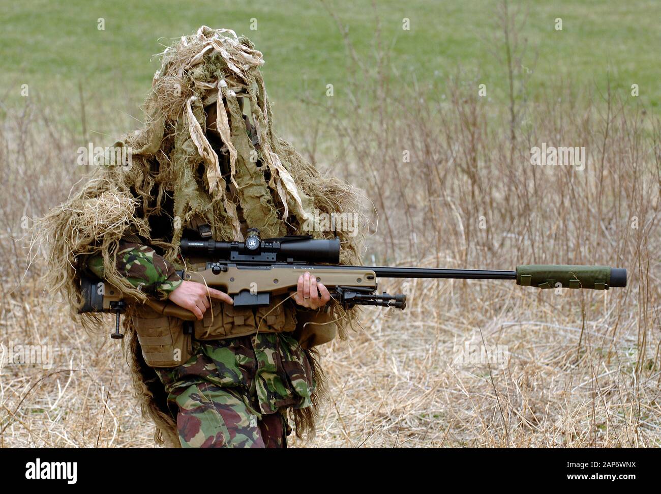 British Infantryman with a long range sniper rifle L115A3 which has a ...