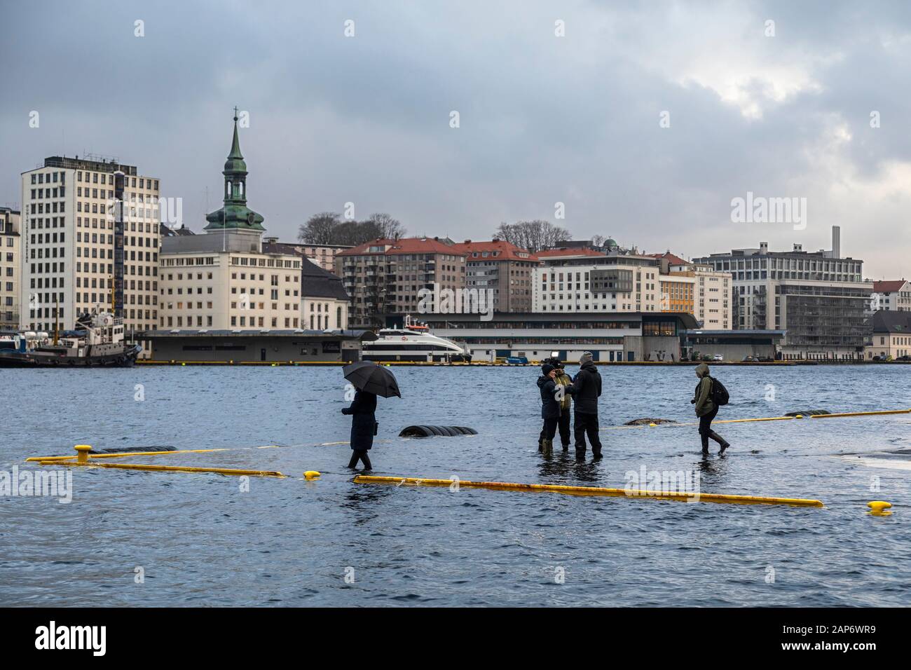 Port of Bergen, Norway. A day with exceptional high tide. Media people ...